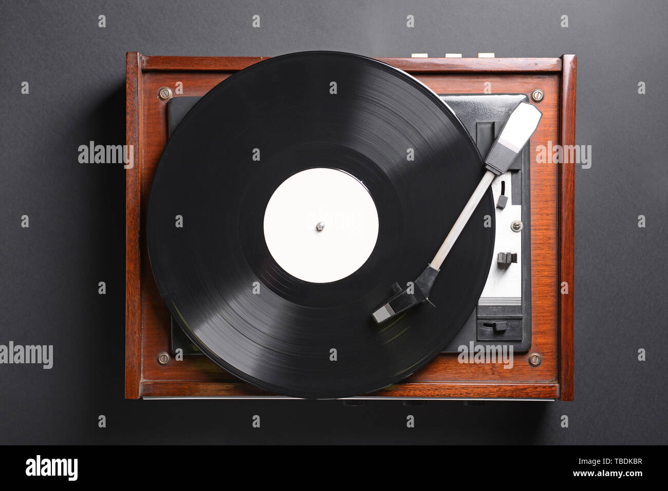 Record player with vinyl disc on dark background Stock Photo - Alamy