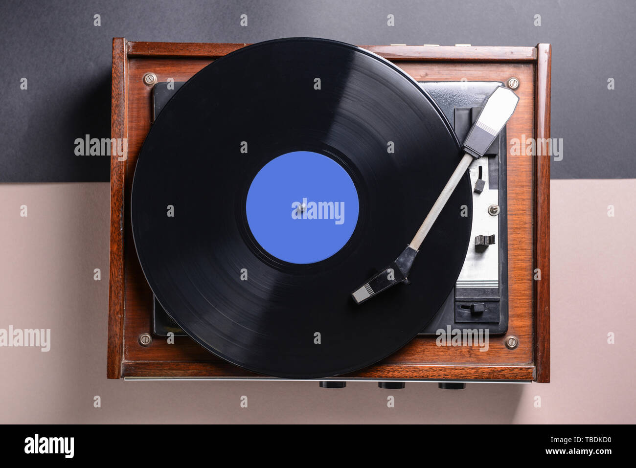 Record player with vinyl disc on table Stock Photo - Alamy