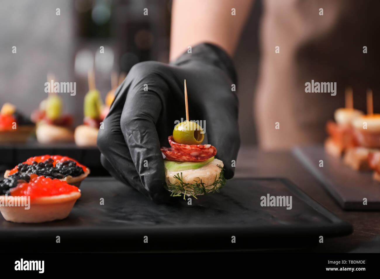 Preparing canapes hi-res stock photography and images - Alamy