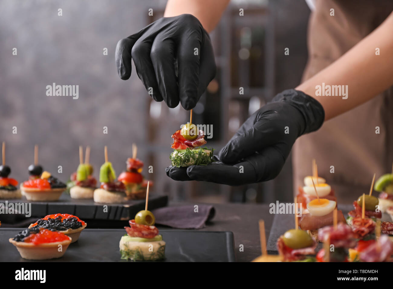 Preparing canapes hi-res stock photography and images - Alamy
