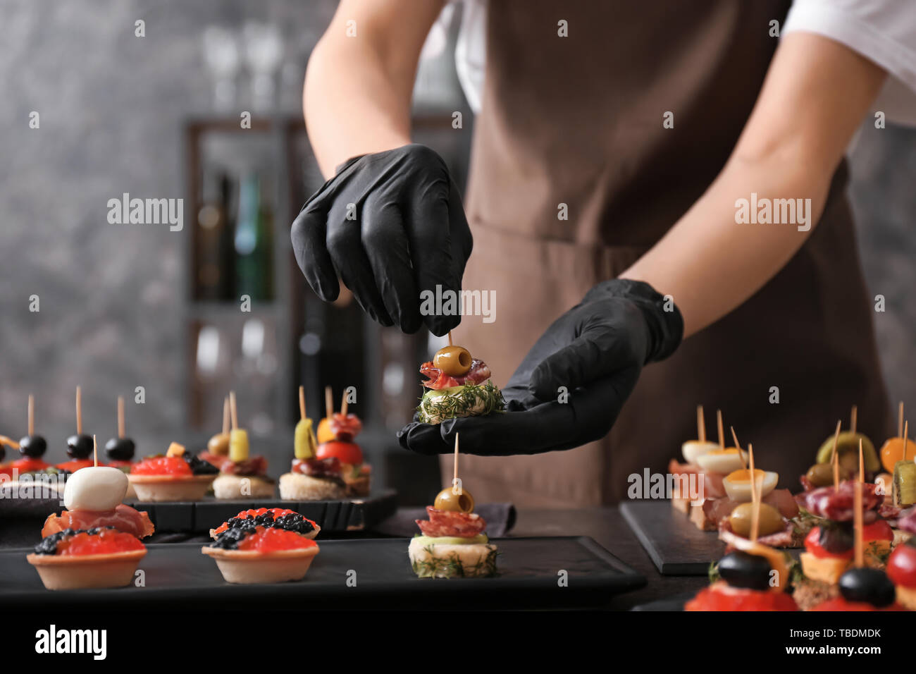Canapes hands hi-res stock photography and images - Alamy