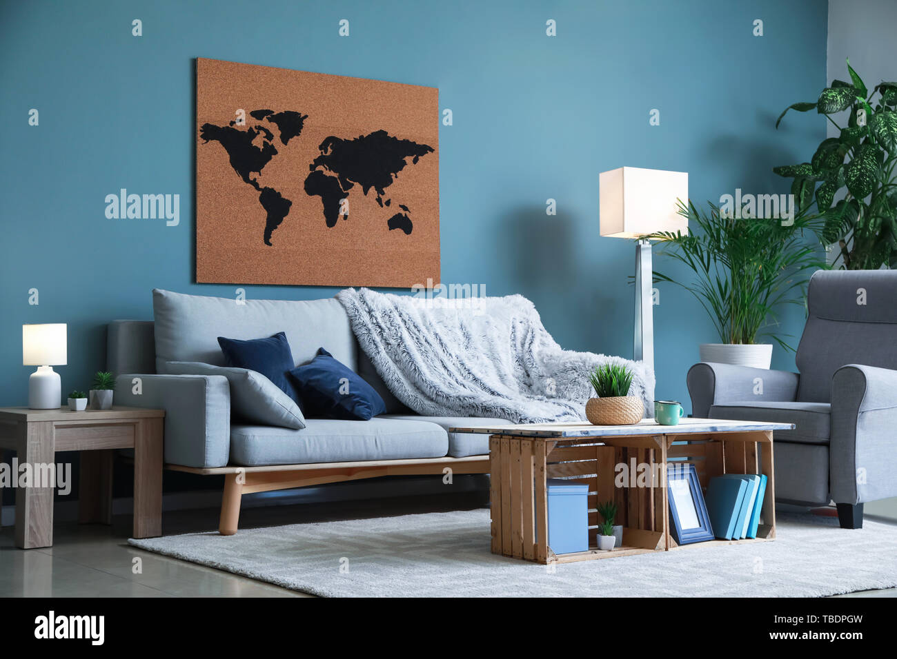 Interior of beautiful room with picture of world map Stock Photo - Alamy