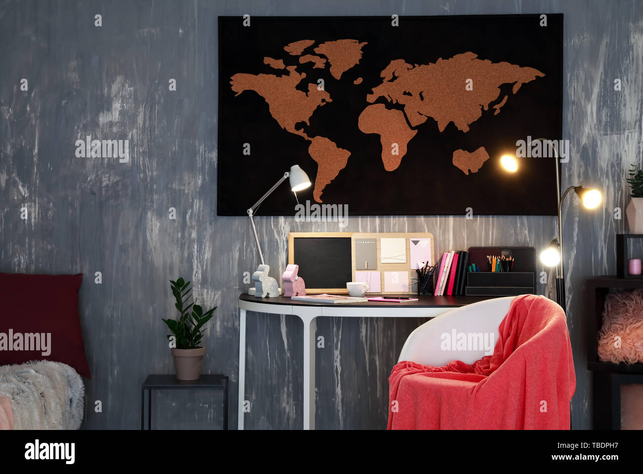 Interior of beautiful room with picture of world map Stock Photo - Alamy