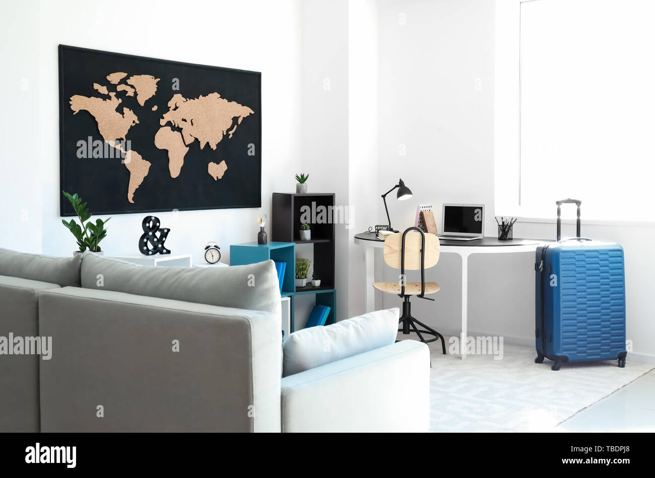 Interior of beautiful room with picture of world map Stock Photo - Alamy