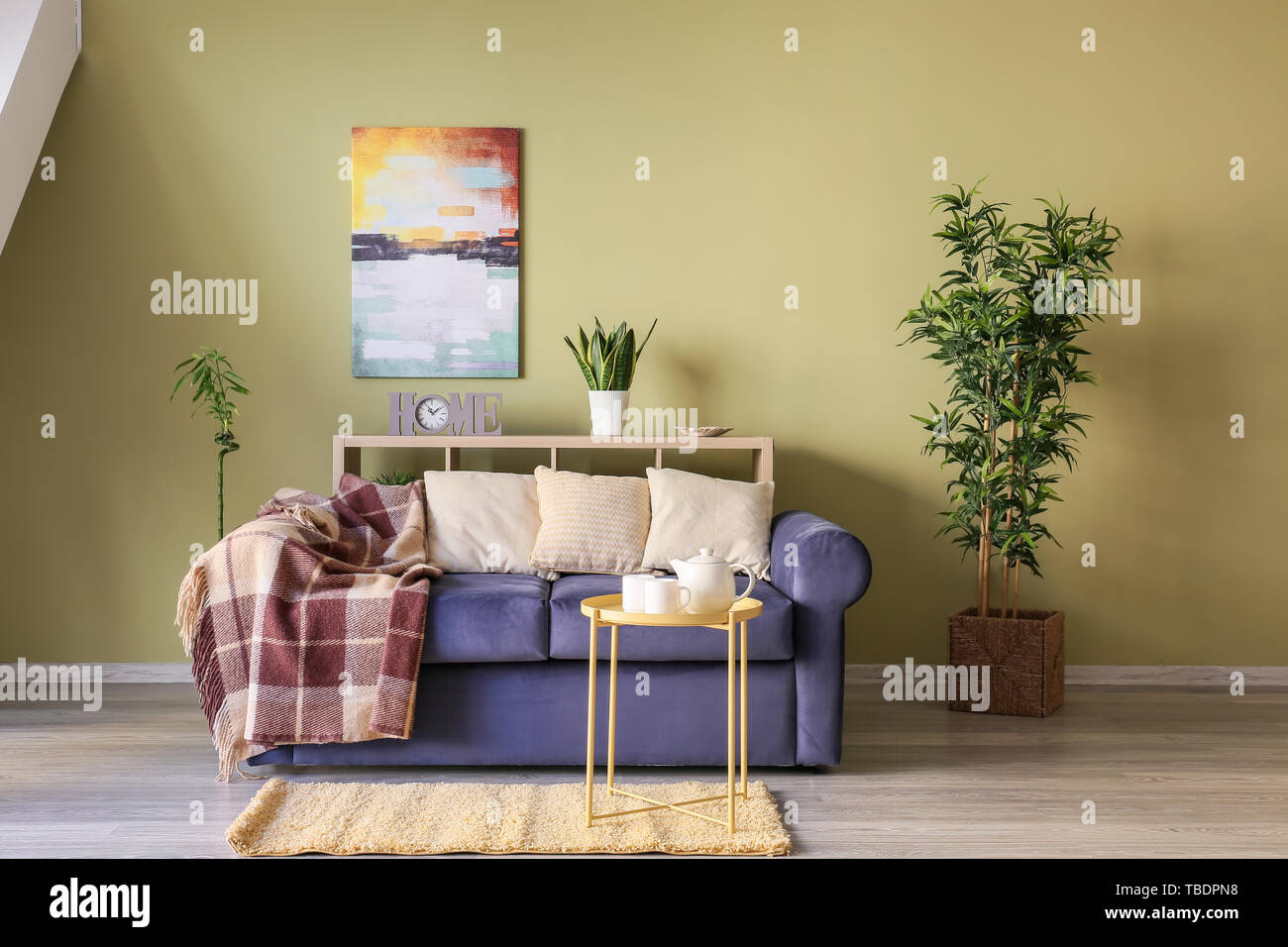 Interior of modern room with comfortable sofa Stock Photo - Alamy