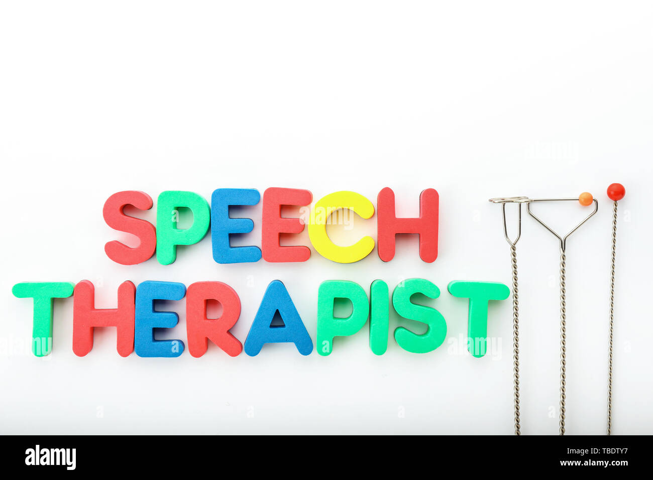 Text SPEECH THERAPIST and tools on white background Stock Photo - Alamy