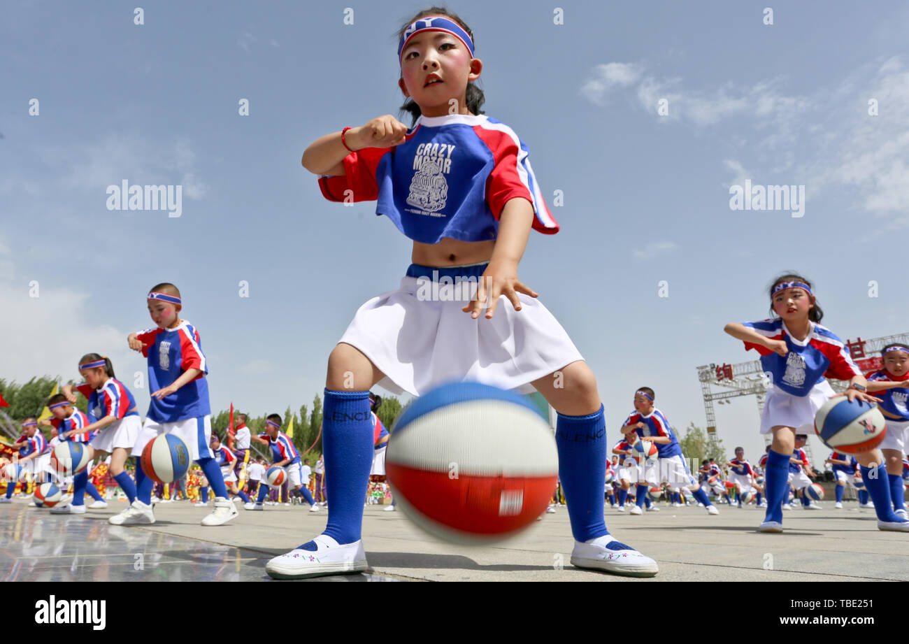 June 1, 2019, Zhangye, China: Children perform basketball dancing in ...