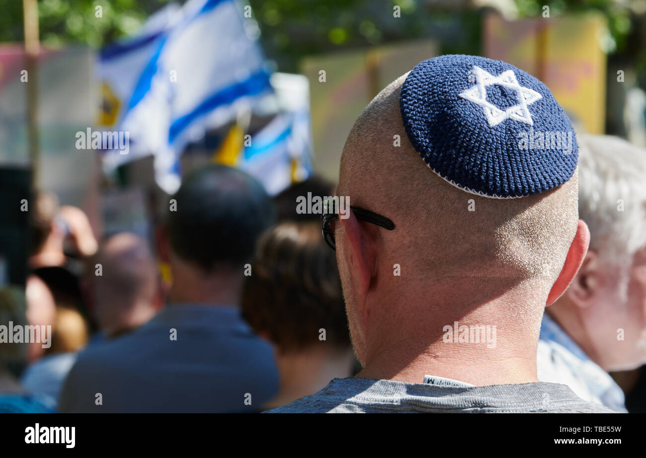 Berlin, Germany. 01st June, 2019. A man with Kippa stands at a pro ...