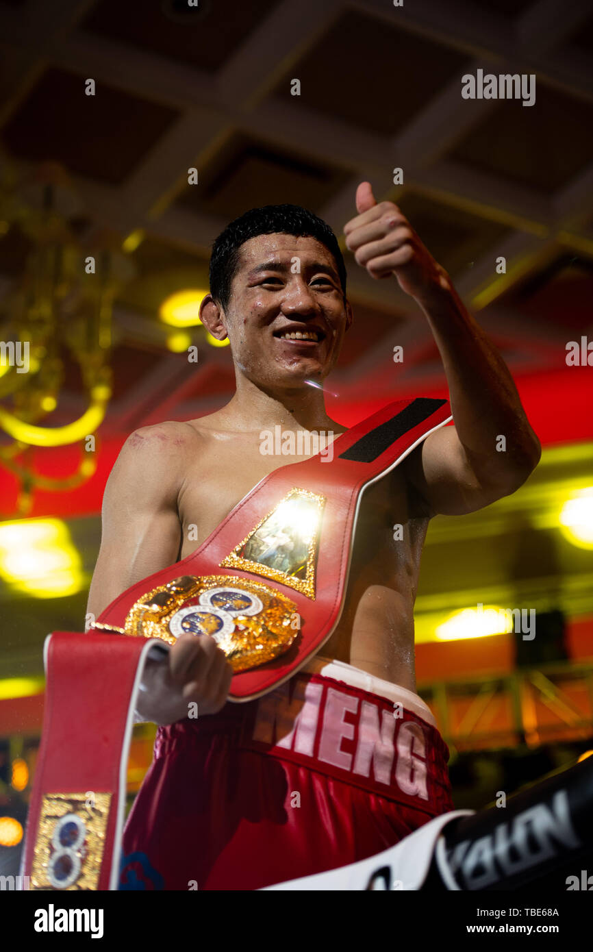 Macao. 1st June, 2019. Meng Fanlong of China celebrates after defeating ...