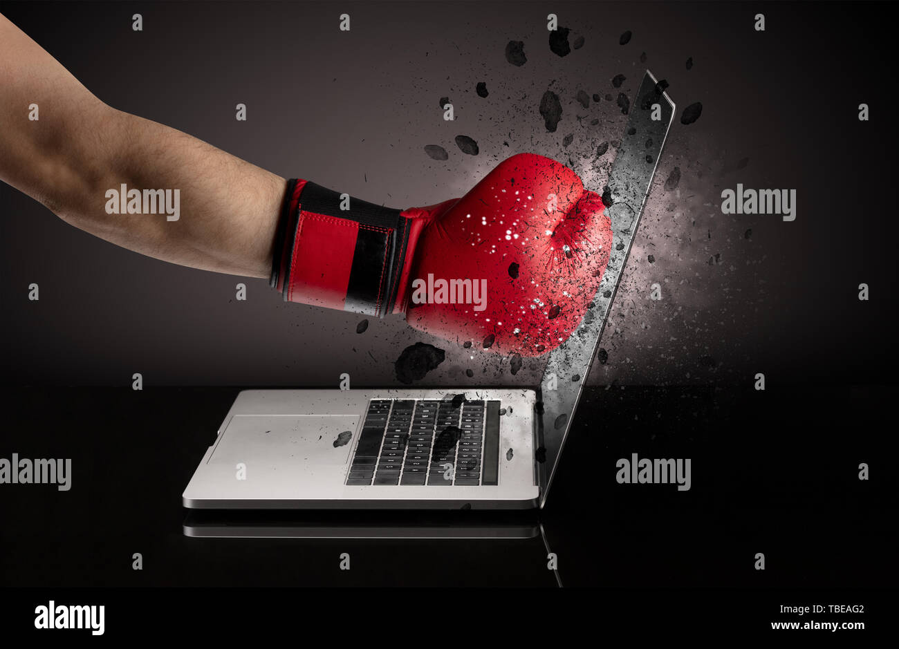 Strong male hand breaks laptop screen glasses Stock Photo - Alamy