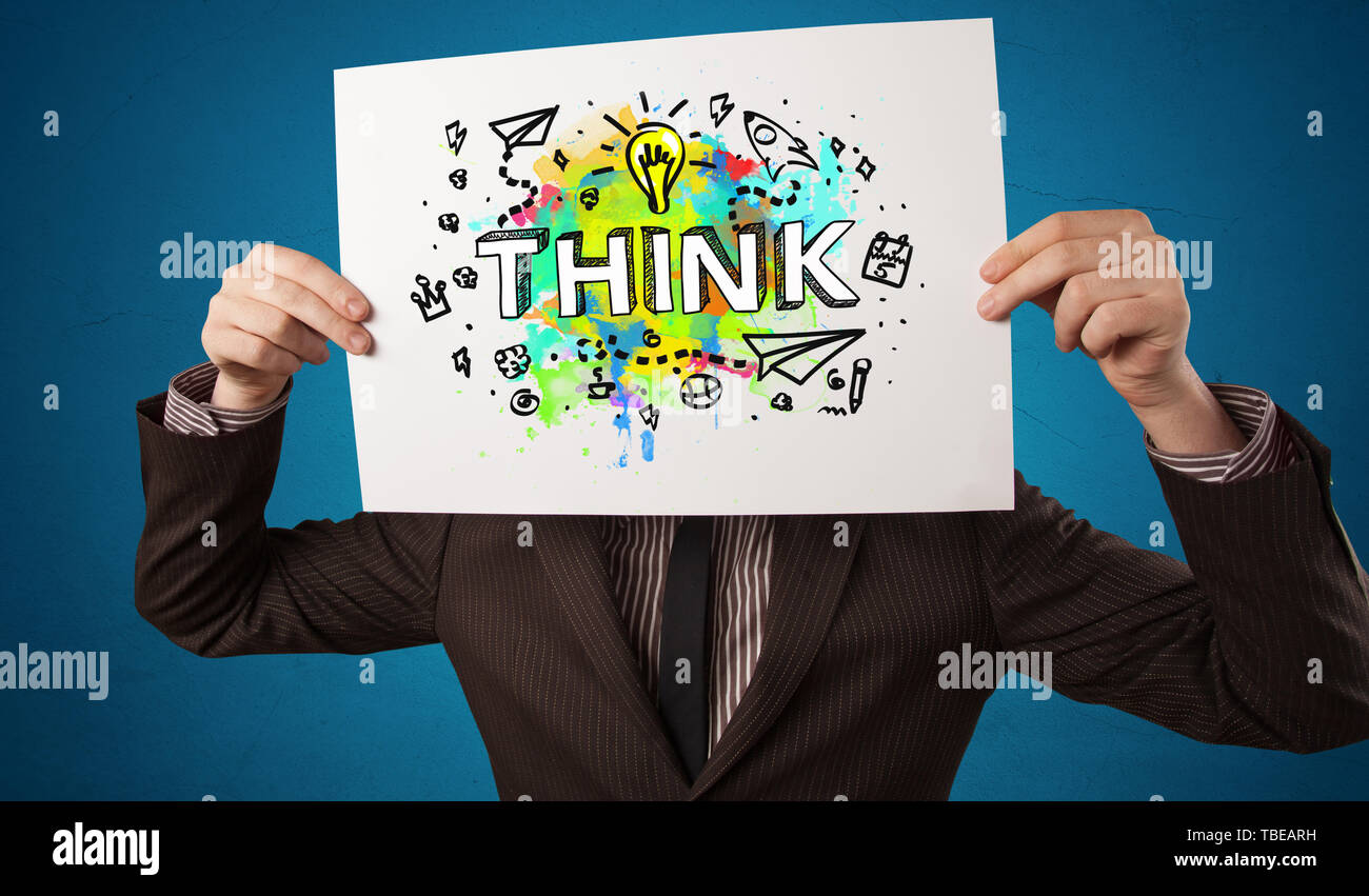 Young person holding paper with design thinking concept Stock Photo - Alamy