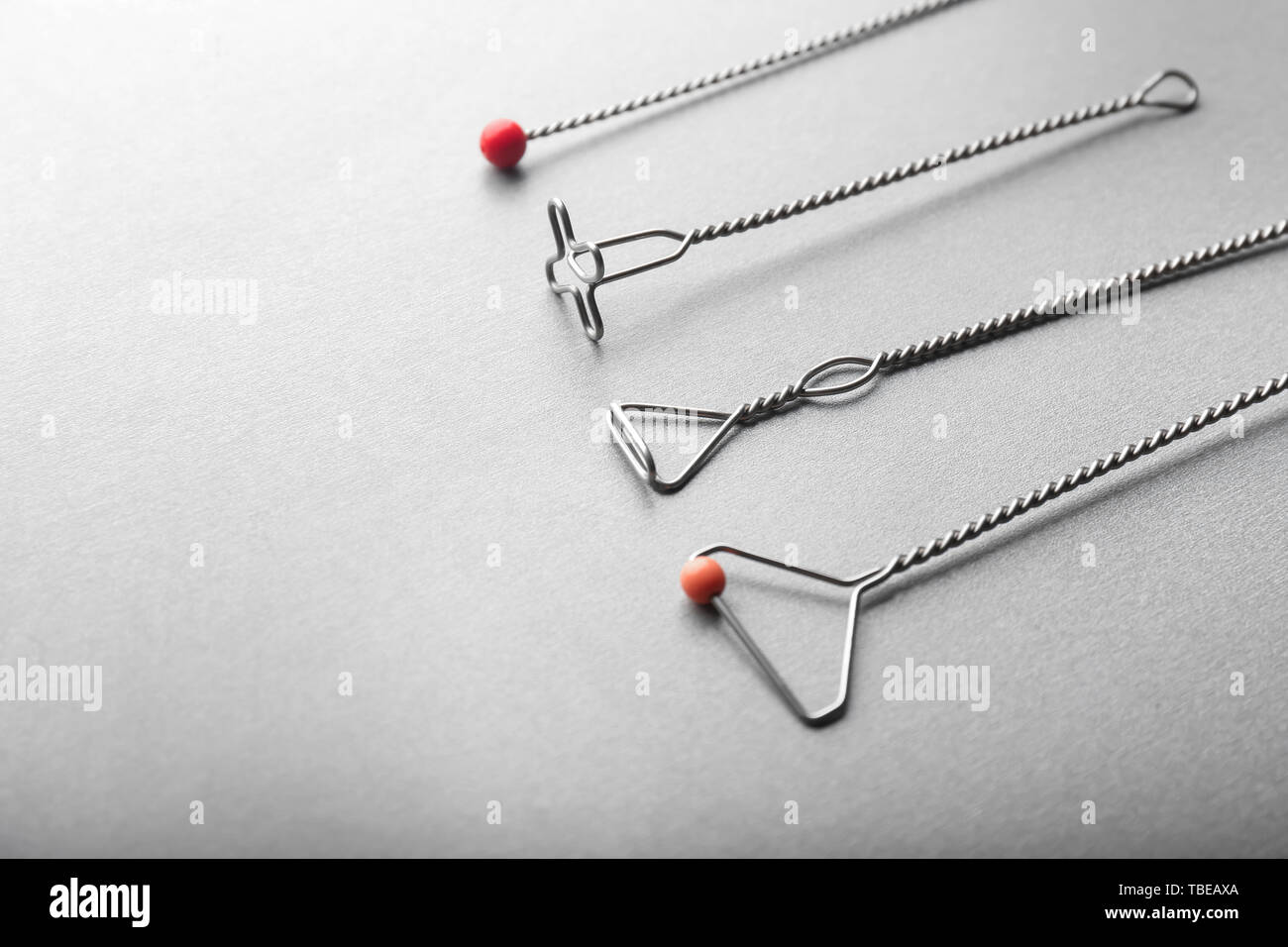 Logopedic probes for speech correction on grey background Stock Photo ...