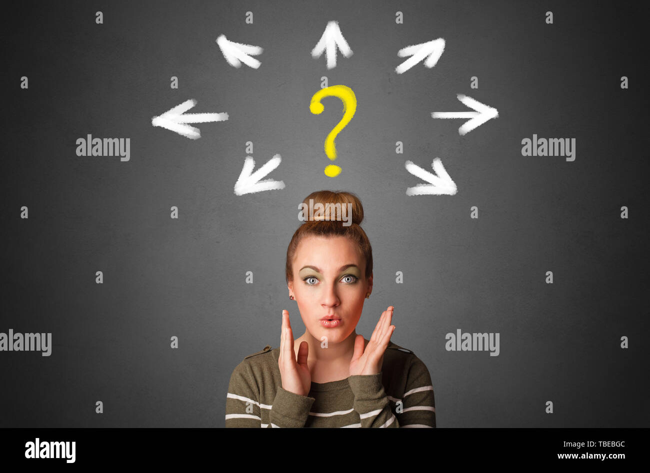 Girl with question marks and direction concept Stock Photo - Alamy