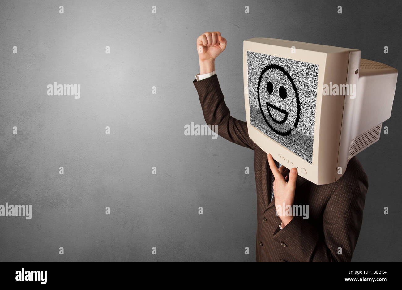 Young person with monitor head, old school smile concept Stock Photo ...