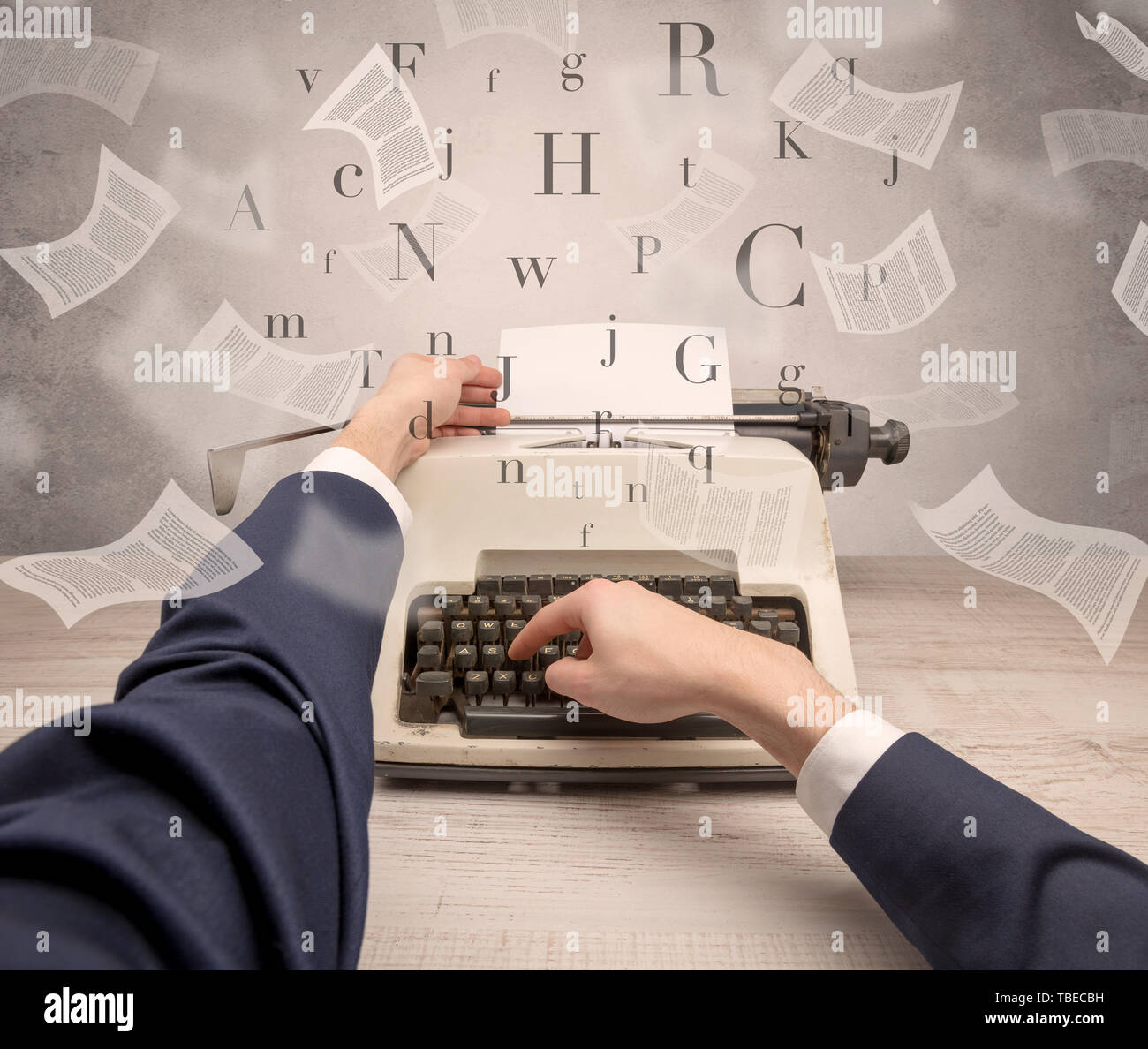 First person perspective hand typewriting with flying documents around ...