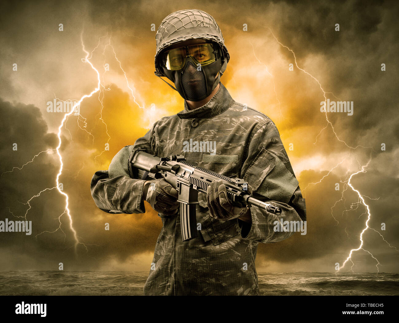 Armed soldier standing in rainy obscure weather Stock Photo - Alamy