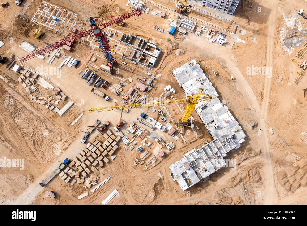 industrial machinery working at construction site. development of new ...