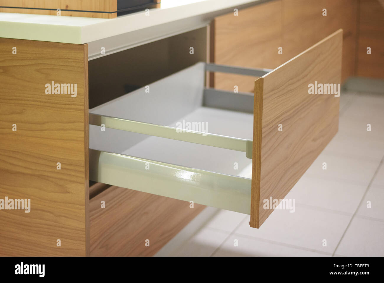 Detail of the functioning of a modern drawer Stock Photo - Alamy
