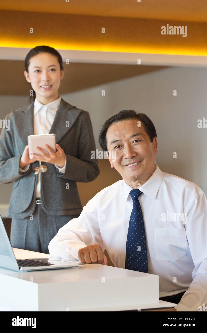 Cooperation among business people Stock Photo - Alamy