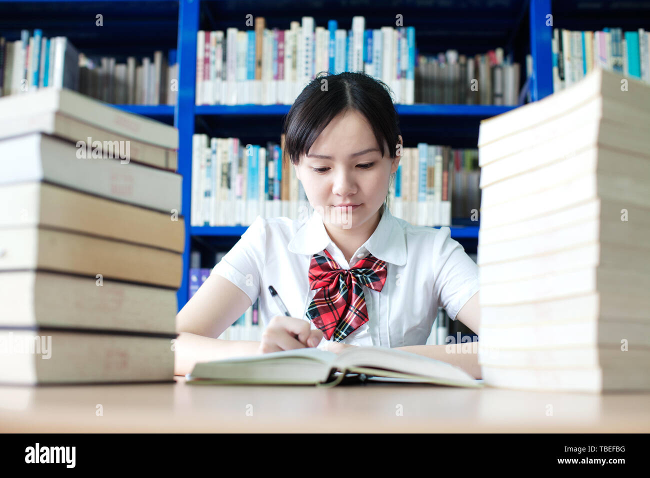 Uniform student study library hi-res stock photography and images - Alamy