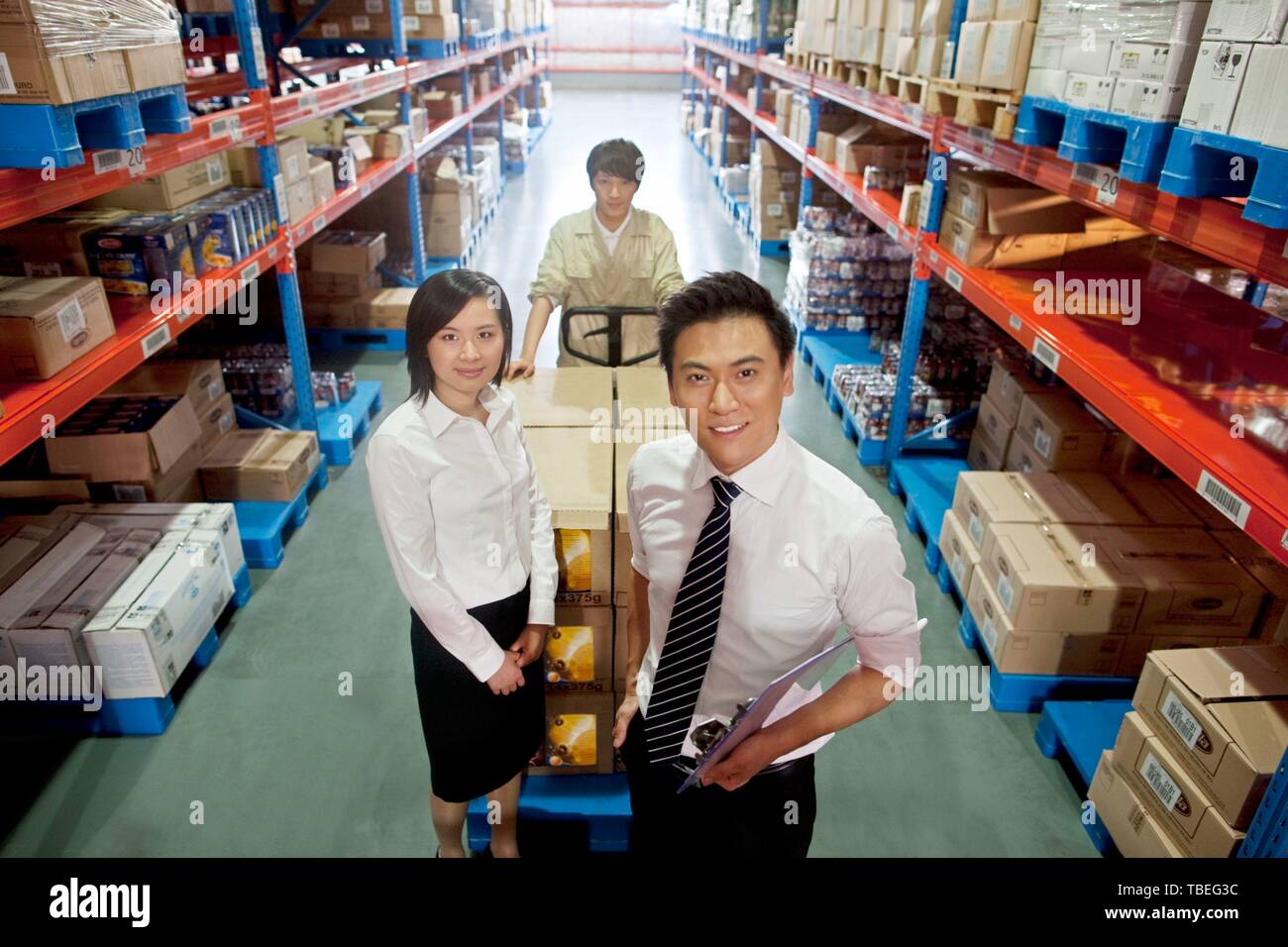 Old woman stacking shelves hi-res stock photography and images - Alamy