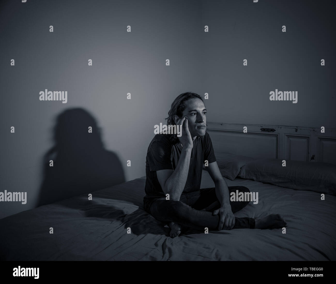 Devastated millennial man crying sad feeling hurt and hopeless ...