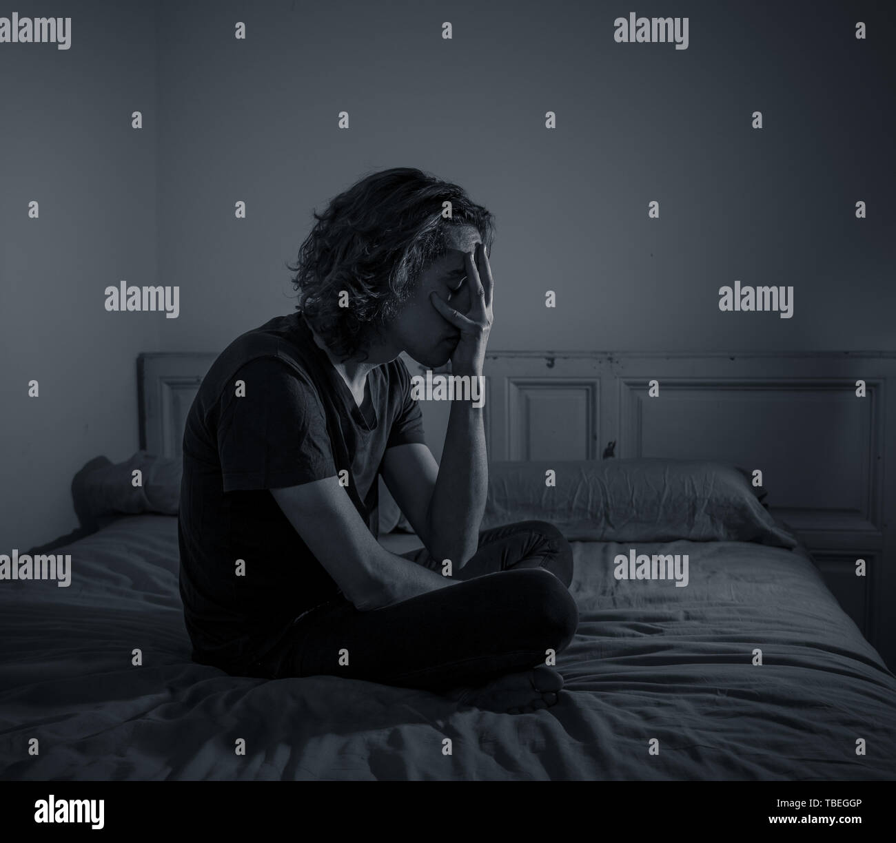 Devastated millennial man crying sad feeling hurt and hopeless ...