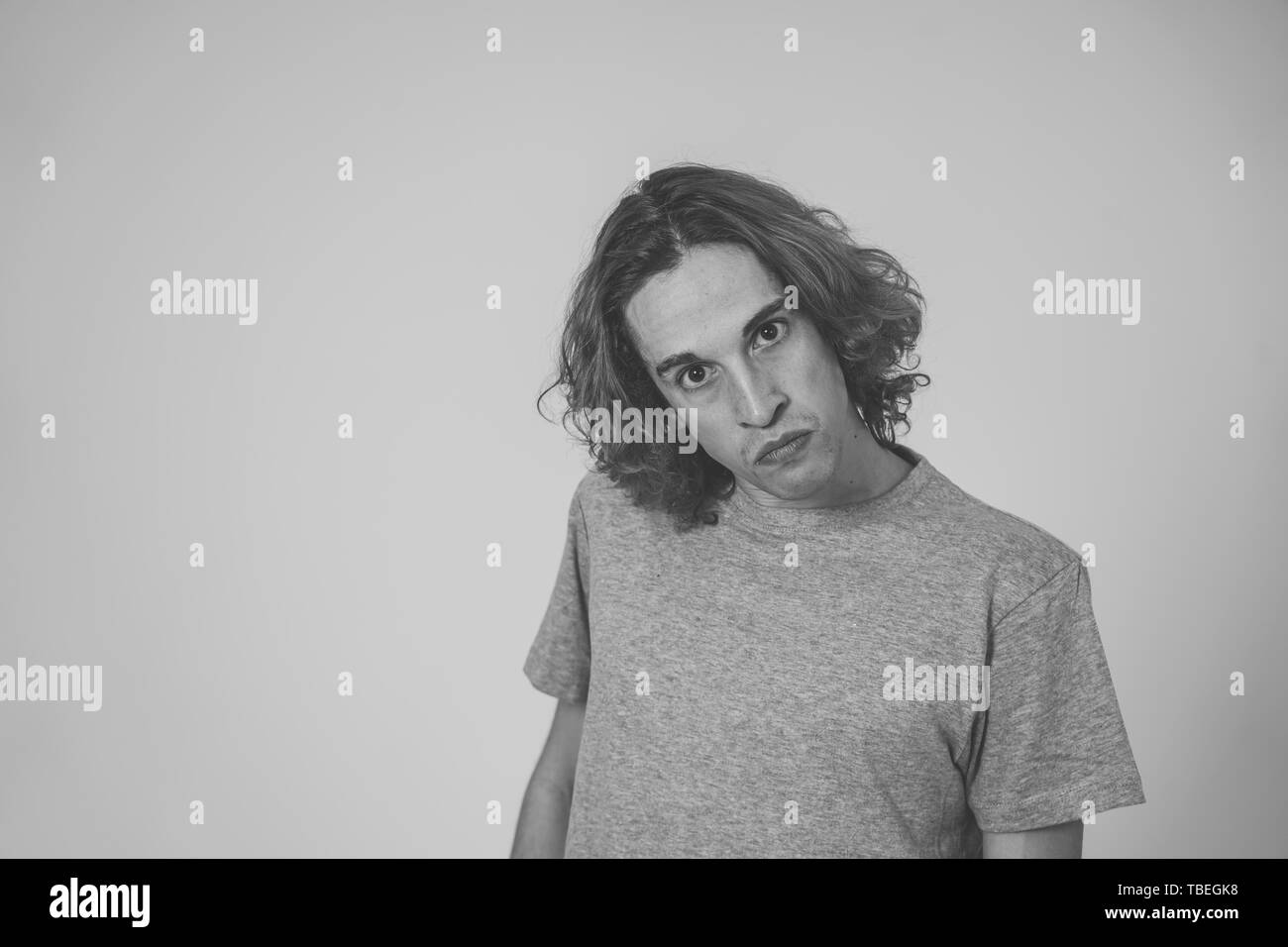 Portrait of young teen male with angry face looking displeased and ...