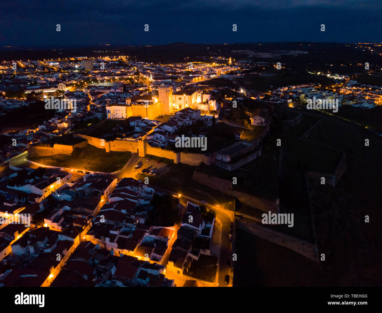 Aerial view of illuminated Castle of Estremoz with cityscape on ...