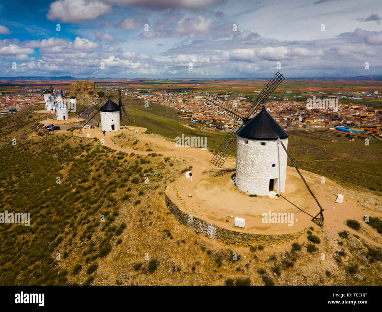 Scenic view from drone of ancient windmills and castle ruins atop Cerro ...