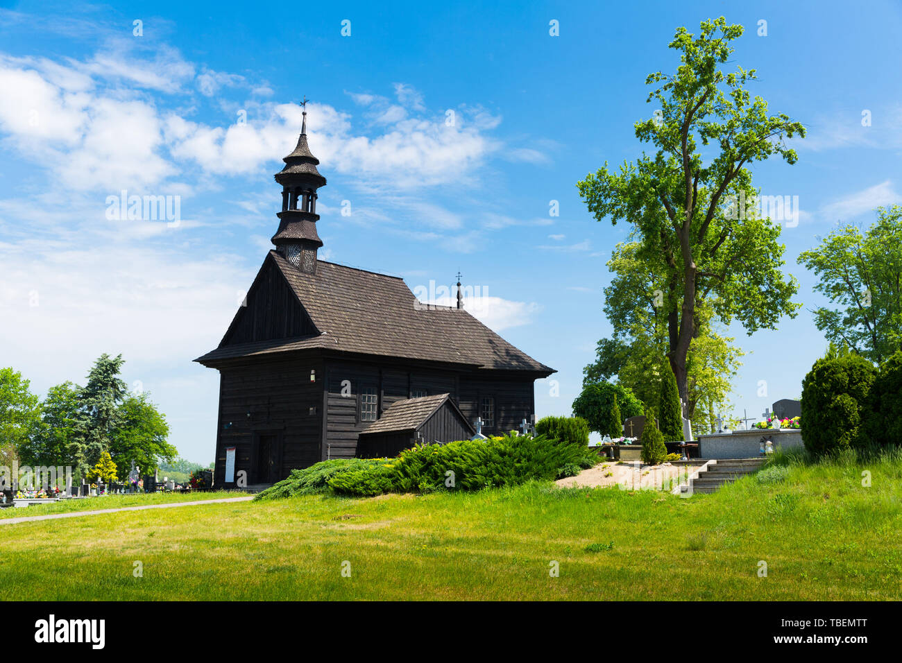 Ancient wooden Roman Catholic St.Isaac church located in cemetery in ...