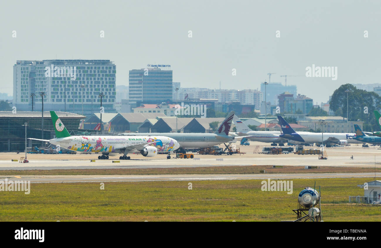 Saigon, Vietnam - Apr 23, 2019. Passenger airplanes docking at Tan Son ...