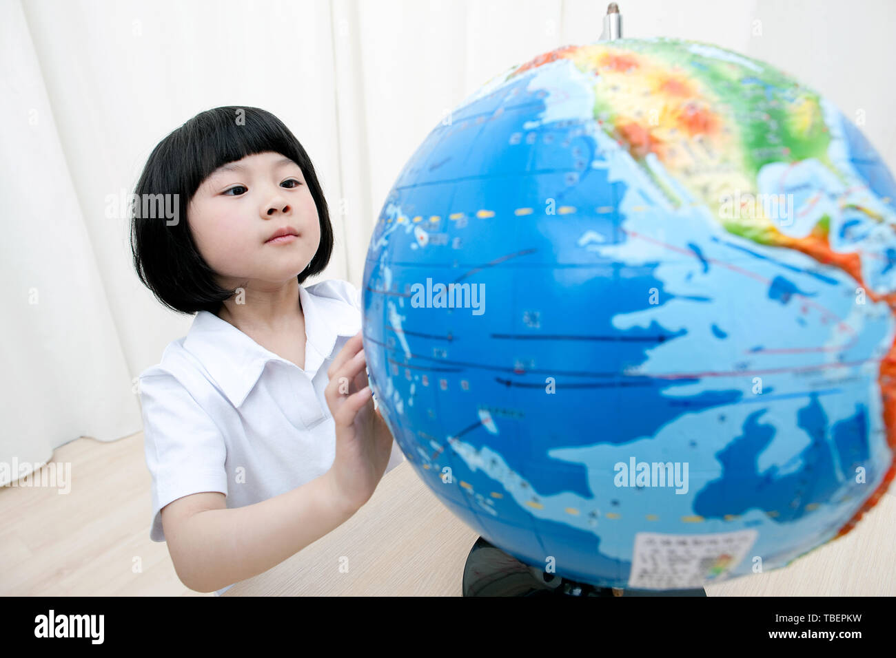 A child acquires knowledge in a game Stock Photo - Alamy