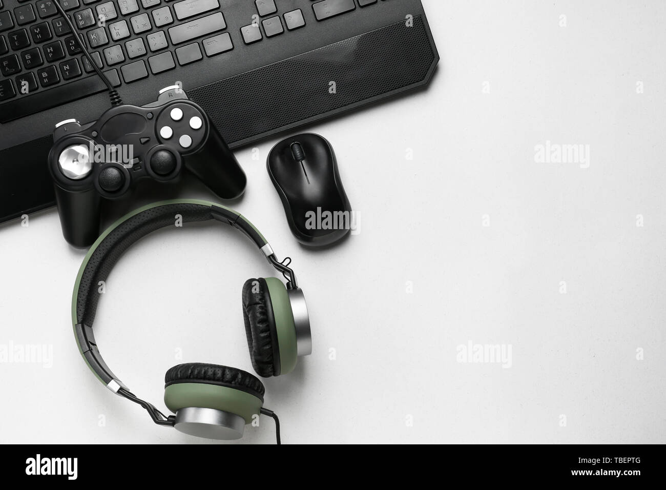Modern gaming accessories on light background Stock Photo - Alamy