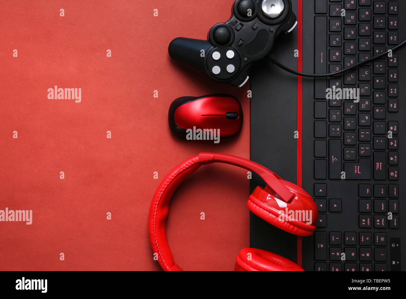 Modern gaming accessories on color background Stock Photo - Alamy