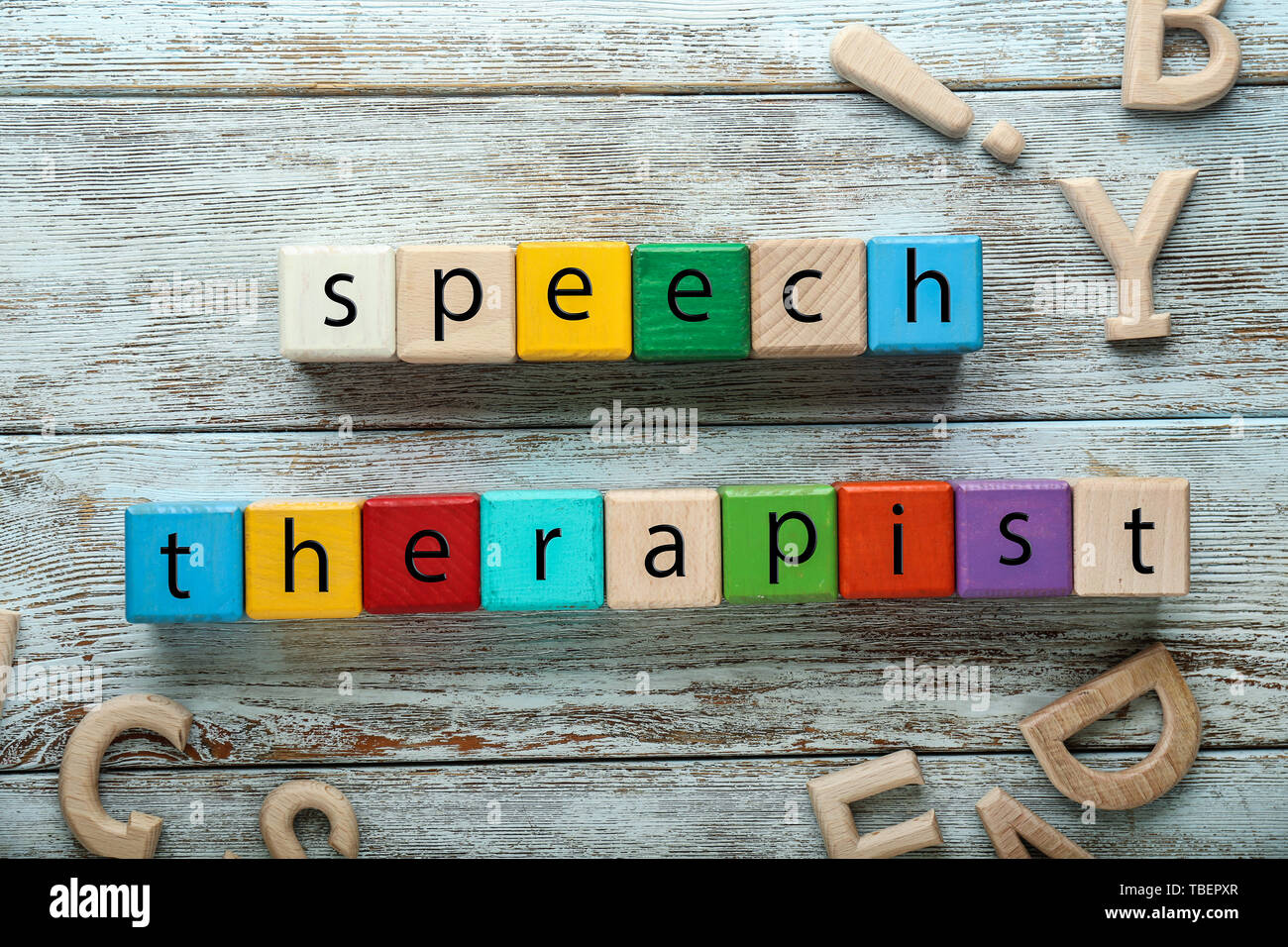 Cubes forming text SPEECH THERAPIST on wooden background Stock Photo ...
