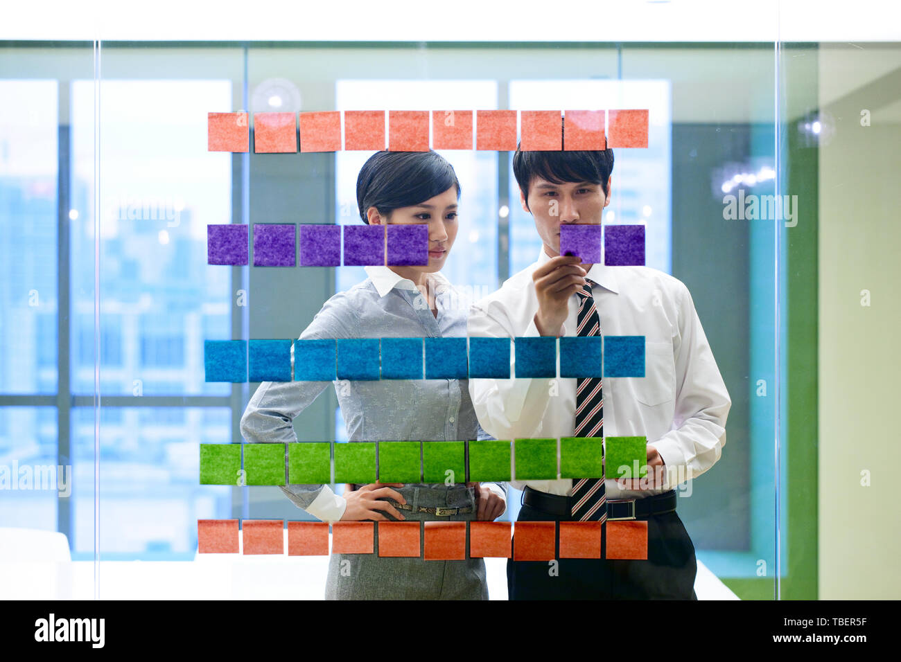 Communication between two business people at work Stock Photo - Alamy