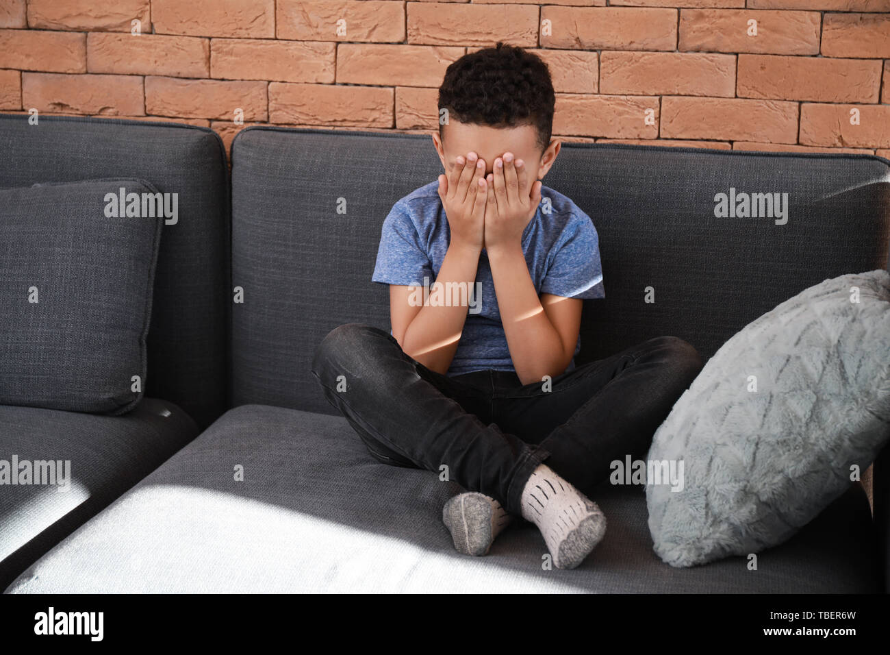 African boy crying hi-res stock photography and images - Alamy