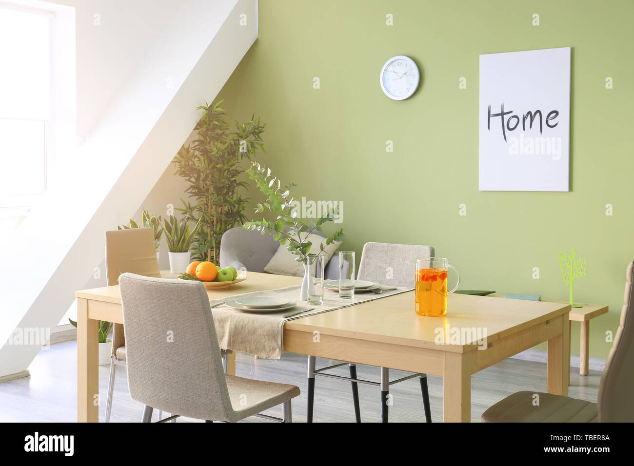 Table served for dinner in interior of dining room Stock Photo - Alamy
