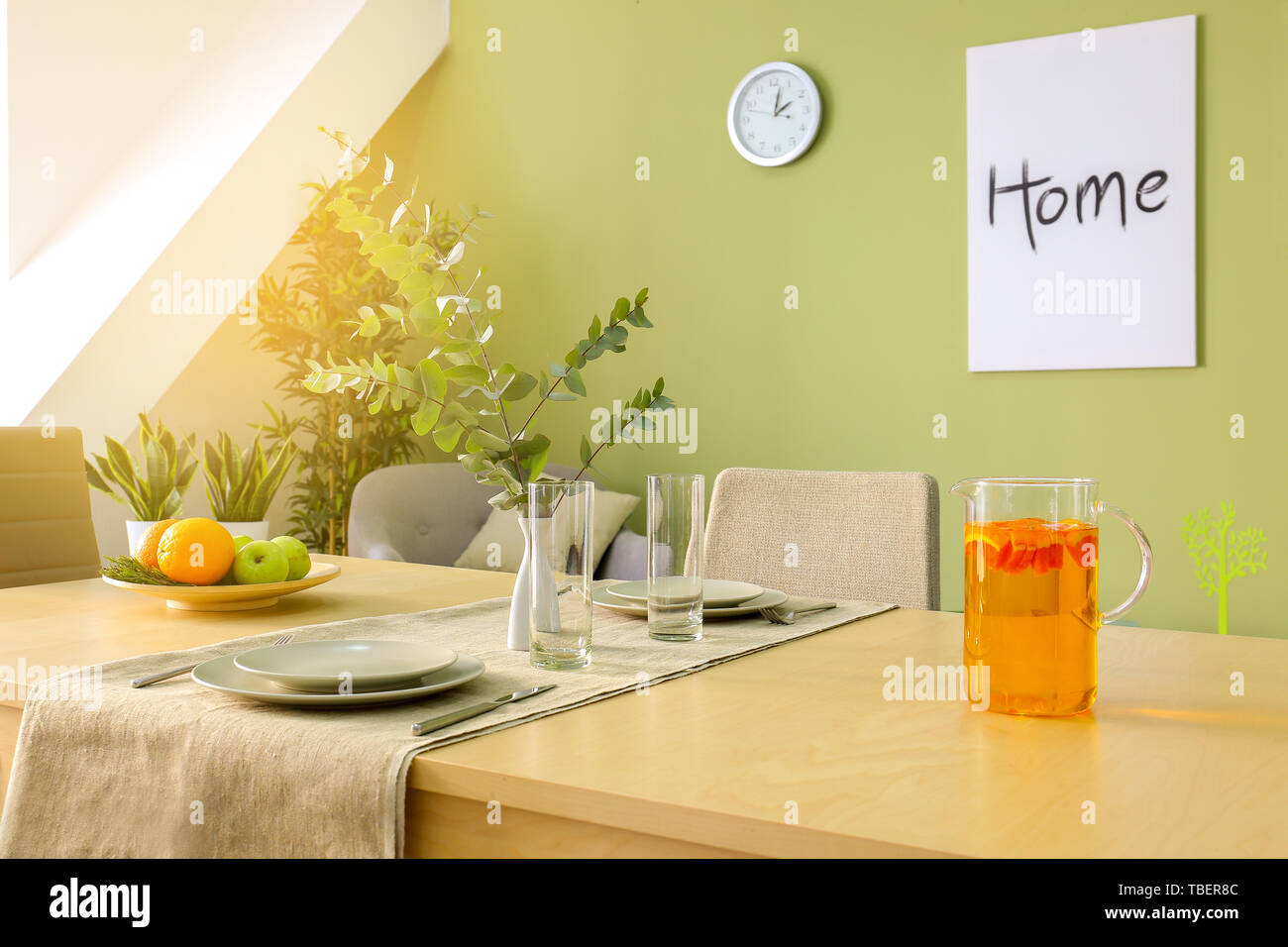 Table served for dinner in interior of dining room Stock Photo - Alamy