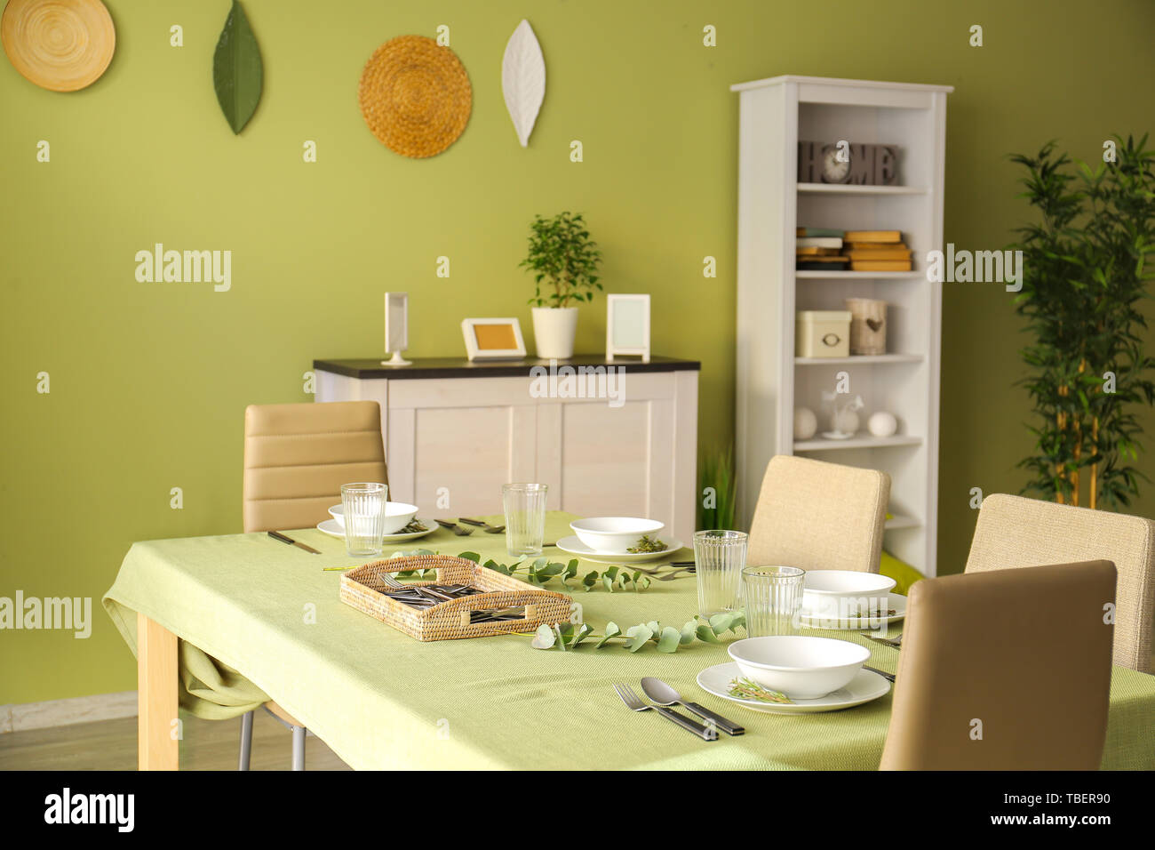 Table served for dinner in interior of dining room Stock Photo - Alamy