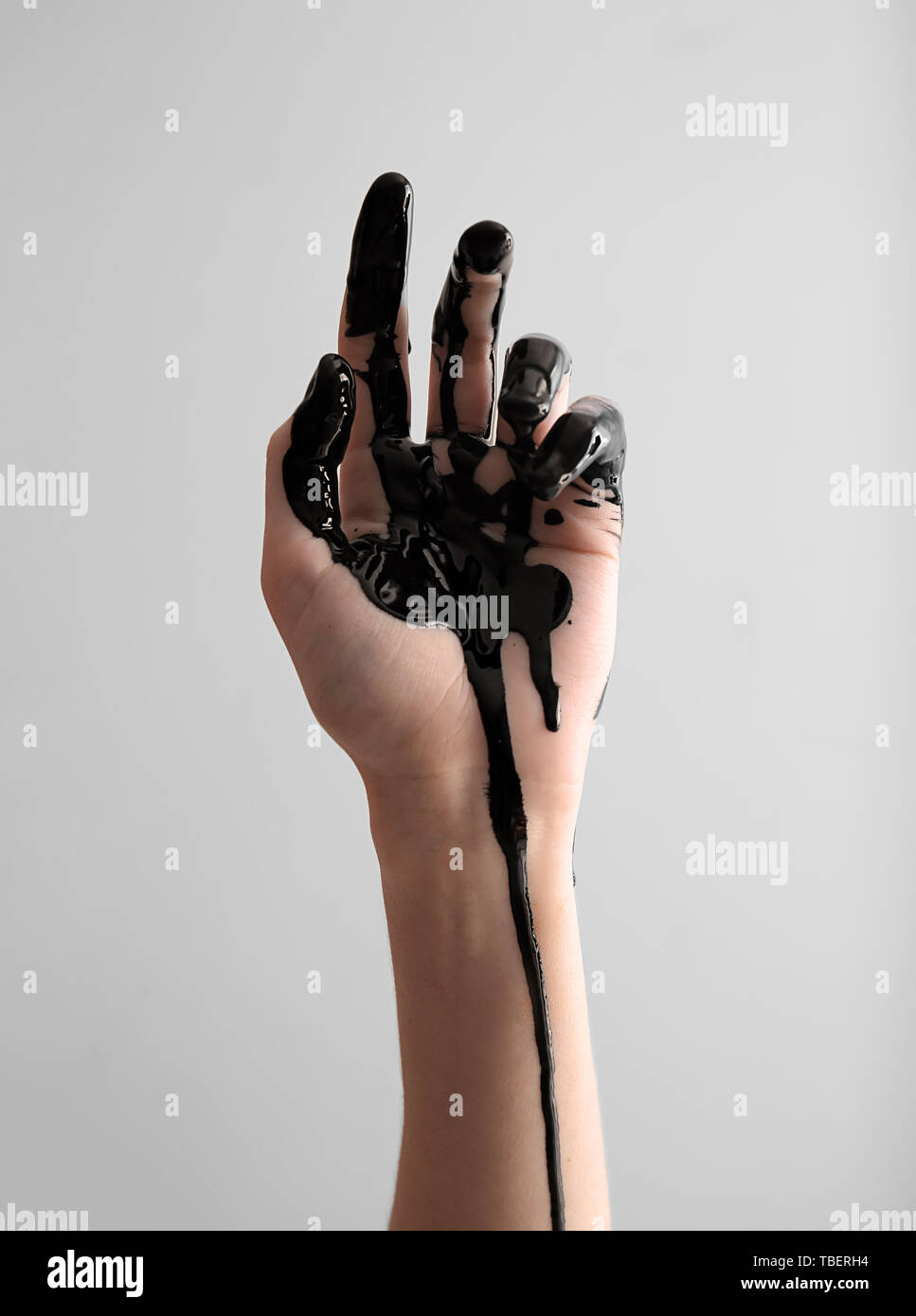 Painted hand on light background Stock Photo - Alamy