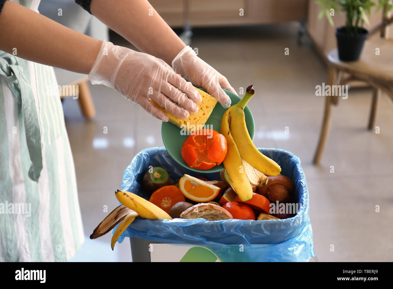 Person throwing food bin hi-res stock photography and images - Alamy