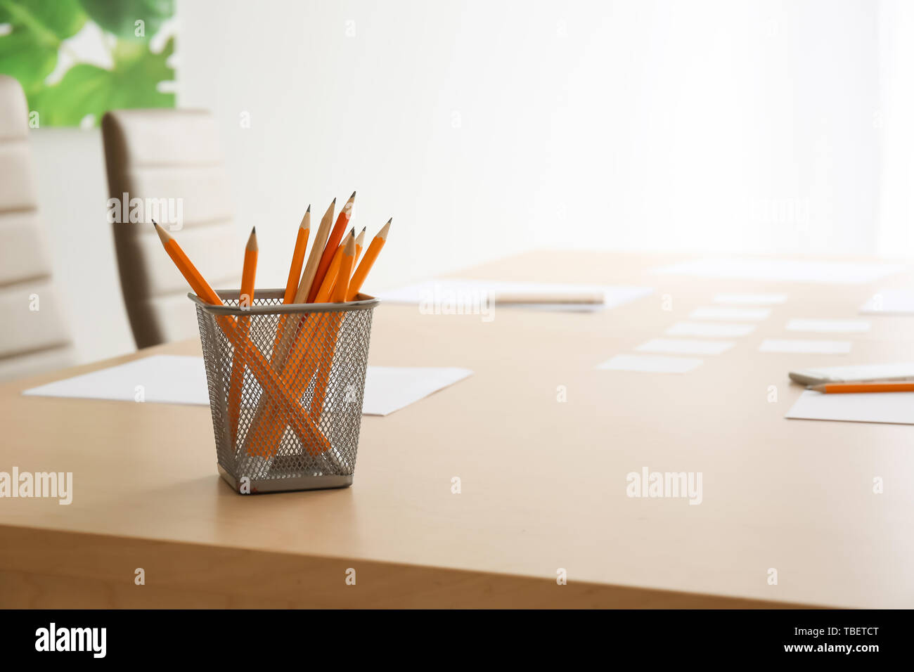 Table with stationery prepared for business meeting in conference hall ...