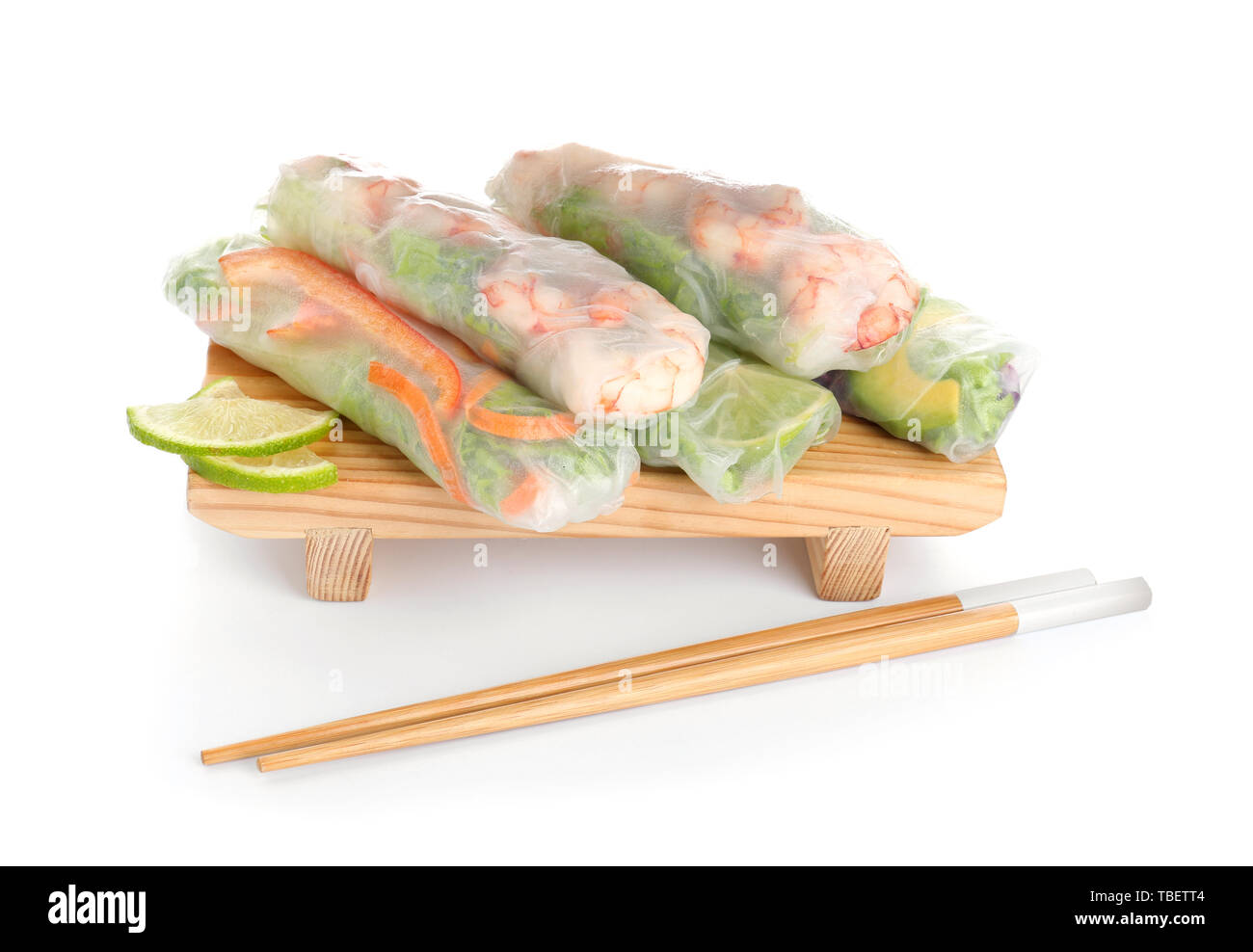 Tasty spring rolls on white background Stock Photo - Alamy