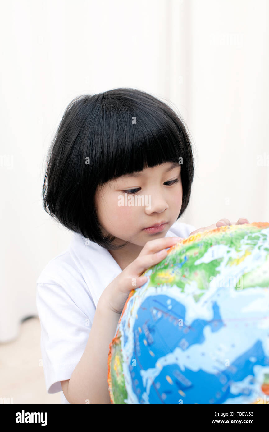 A child acquires knowledge in a game Stock Photo - Alamy