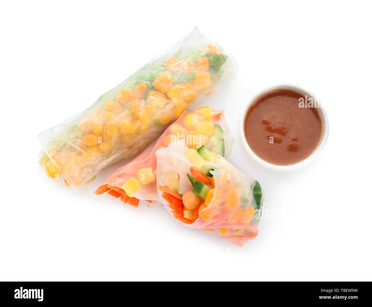 Tasty spring rolls with sauce on white background Stock Photo - Alamy