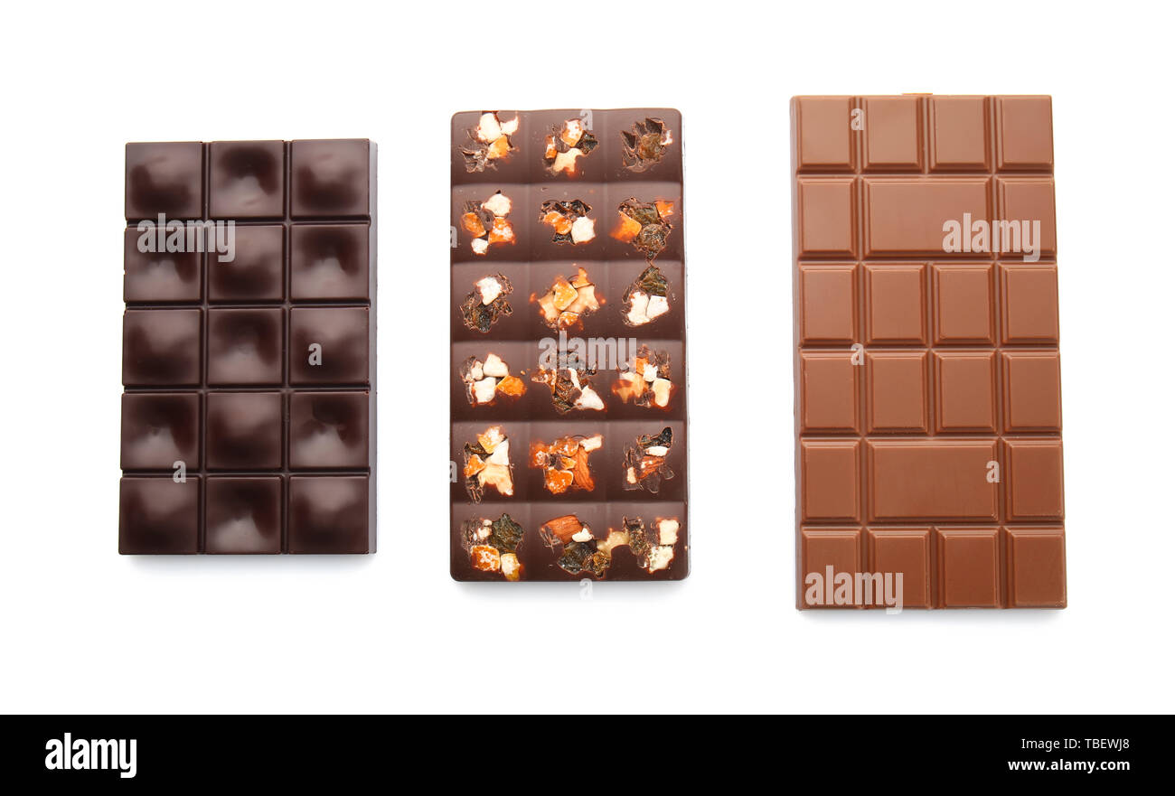 Different bars of tasty chocolate on white background Stock Photo - Alamy