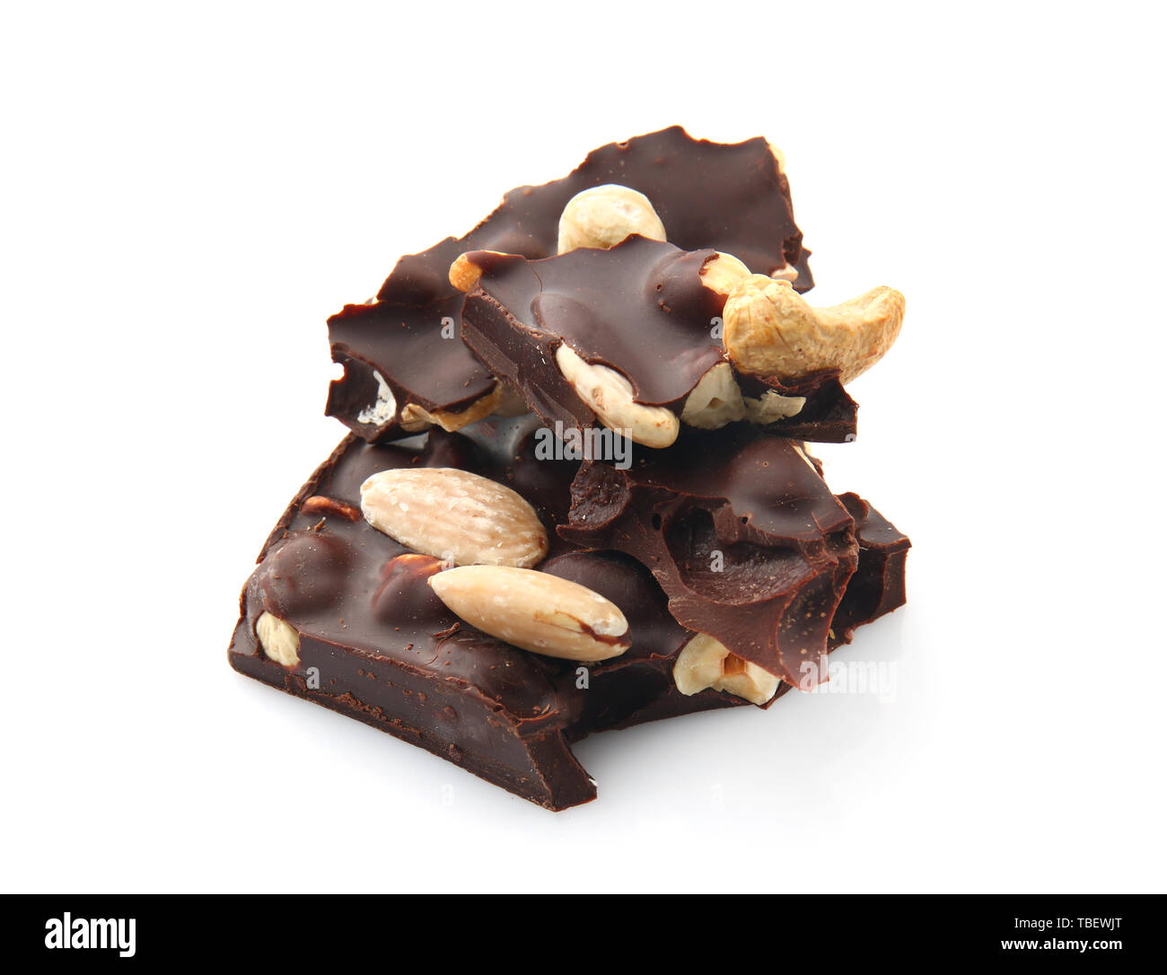 Tasty dark chocolate with nuts on white background Stock Photo - Alamy