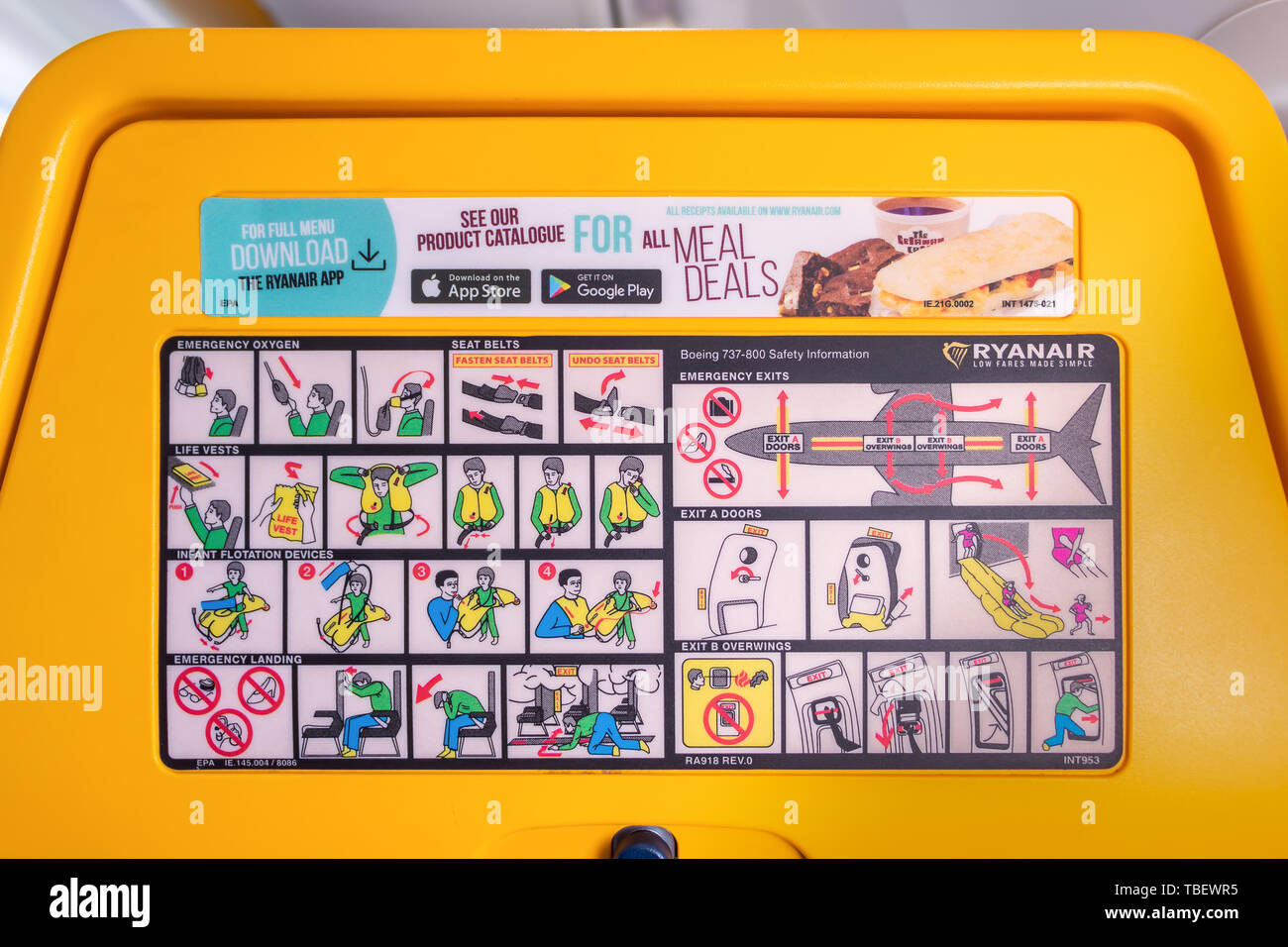 Safety instructions at the back of the seats of a Boeing plane with ...